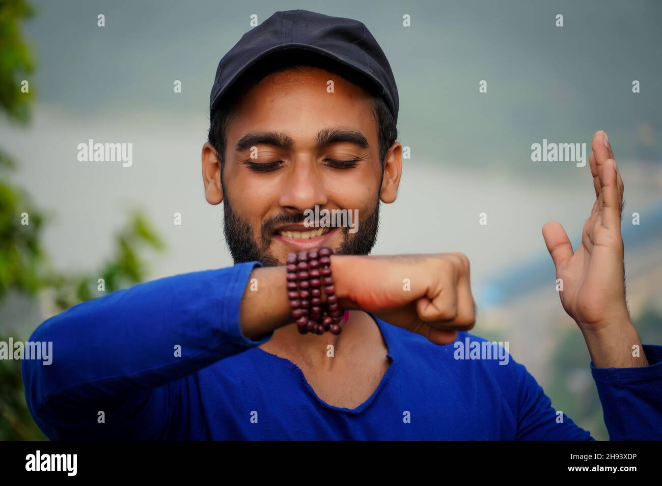 young man showing his hand and making wish Stock Photo - Alamy
