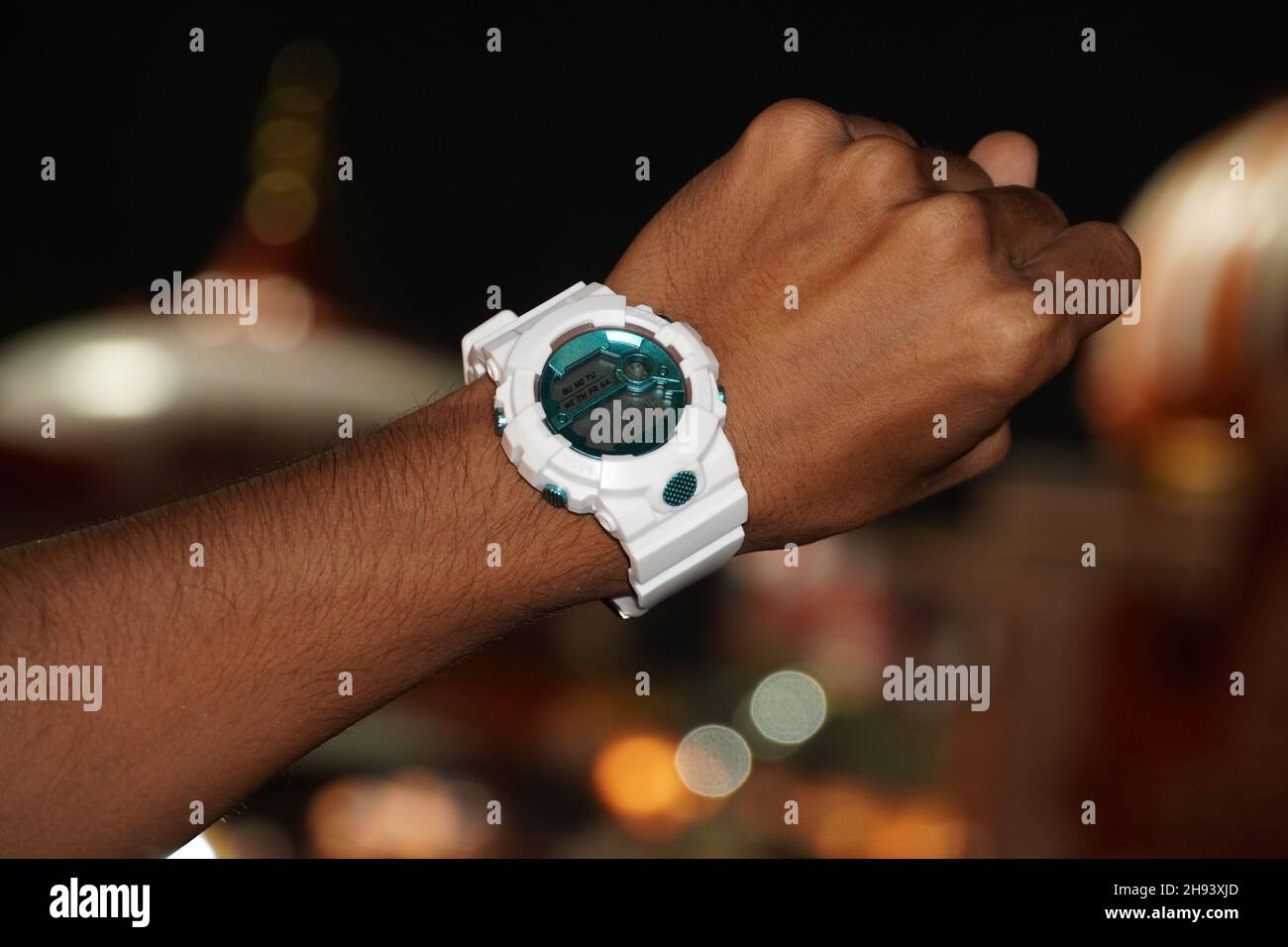 watch in hand showing time Stock Photo - Alamy