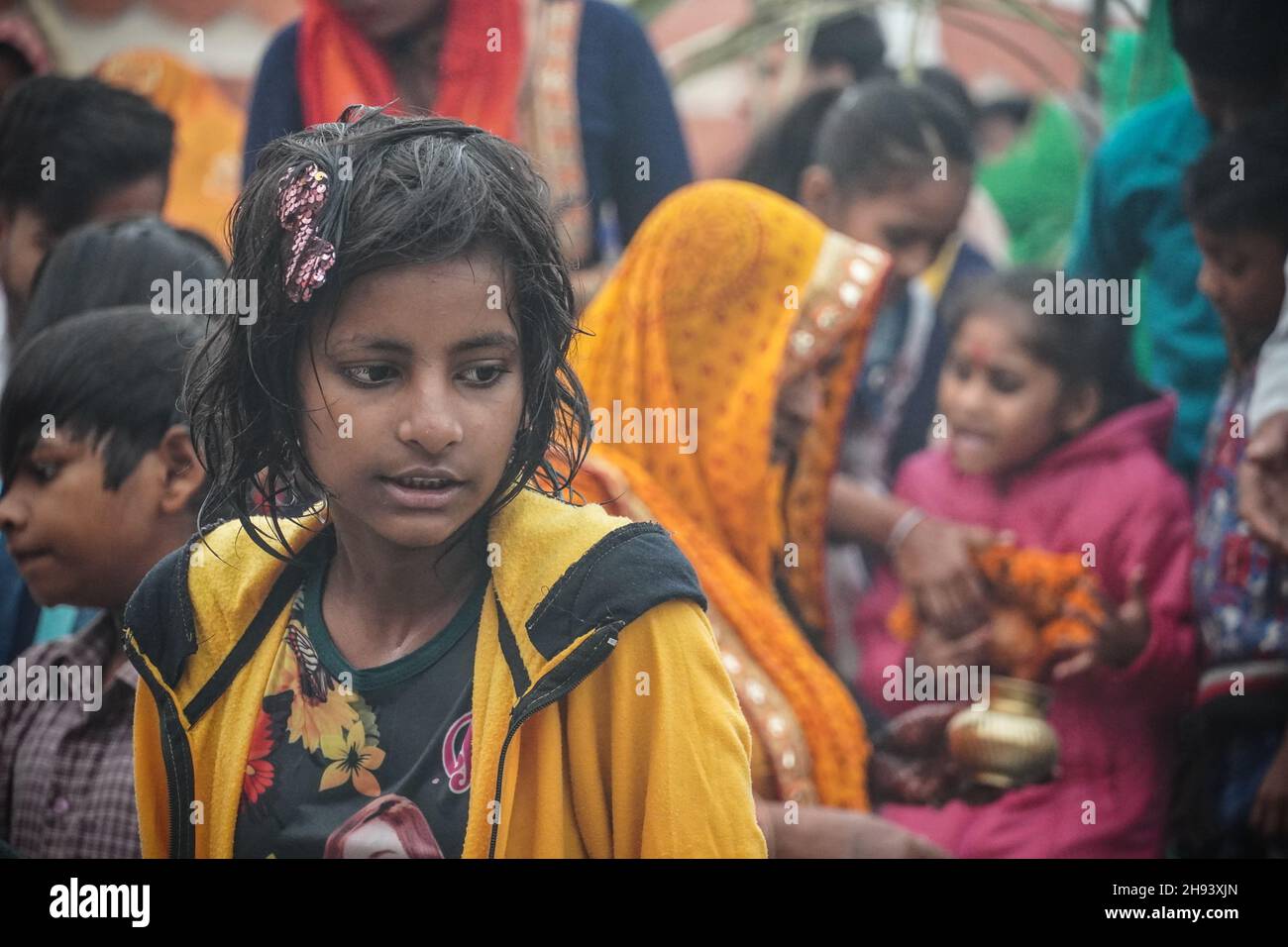 poor girl image in crowd Stock Photo - Alamy