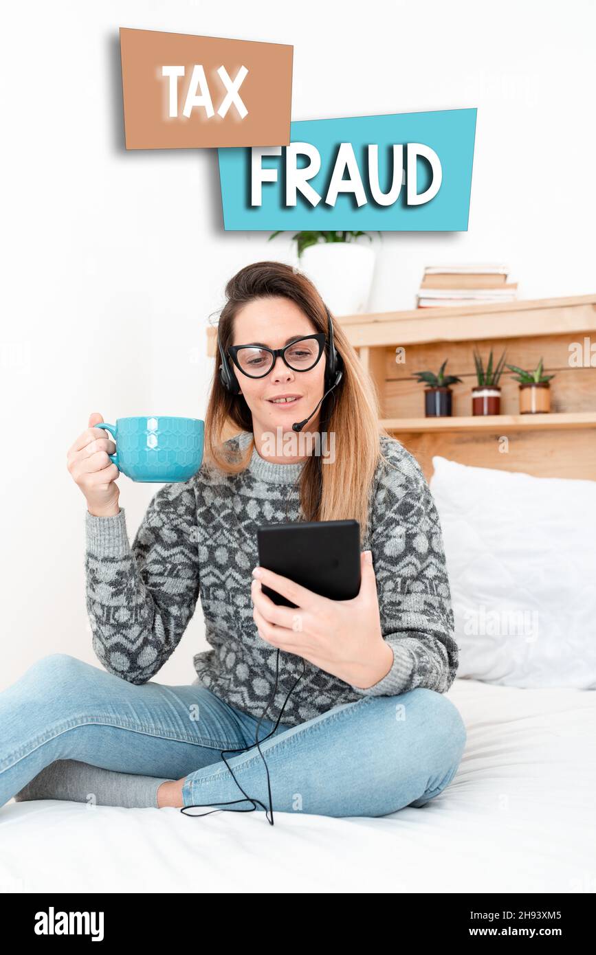 Handwriting text Tax Fraud. Internet Concept entails cheating on a tax ...