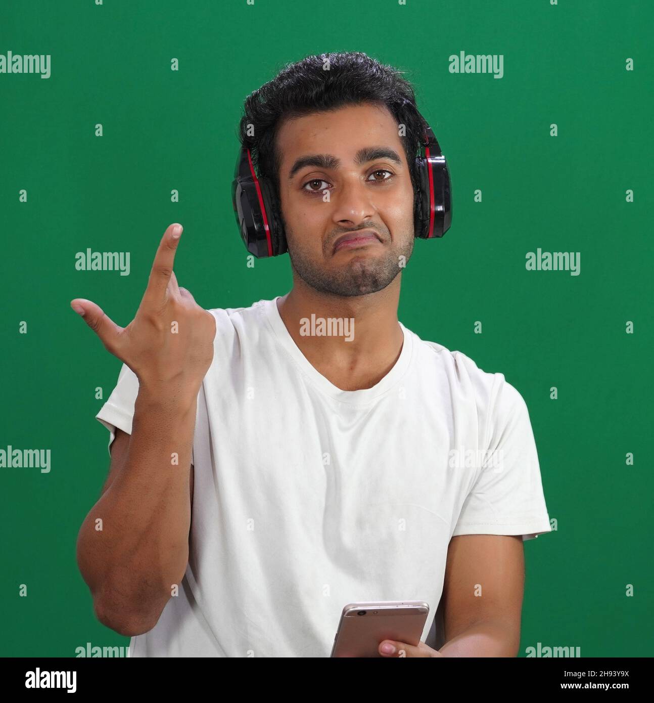 Happy amazed young indian hi-res stock photography and images - Alamy