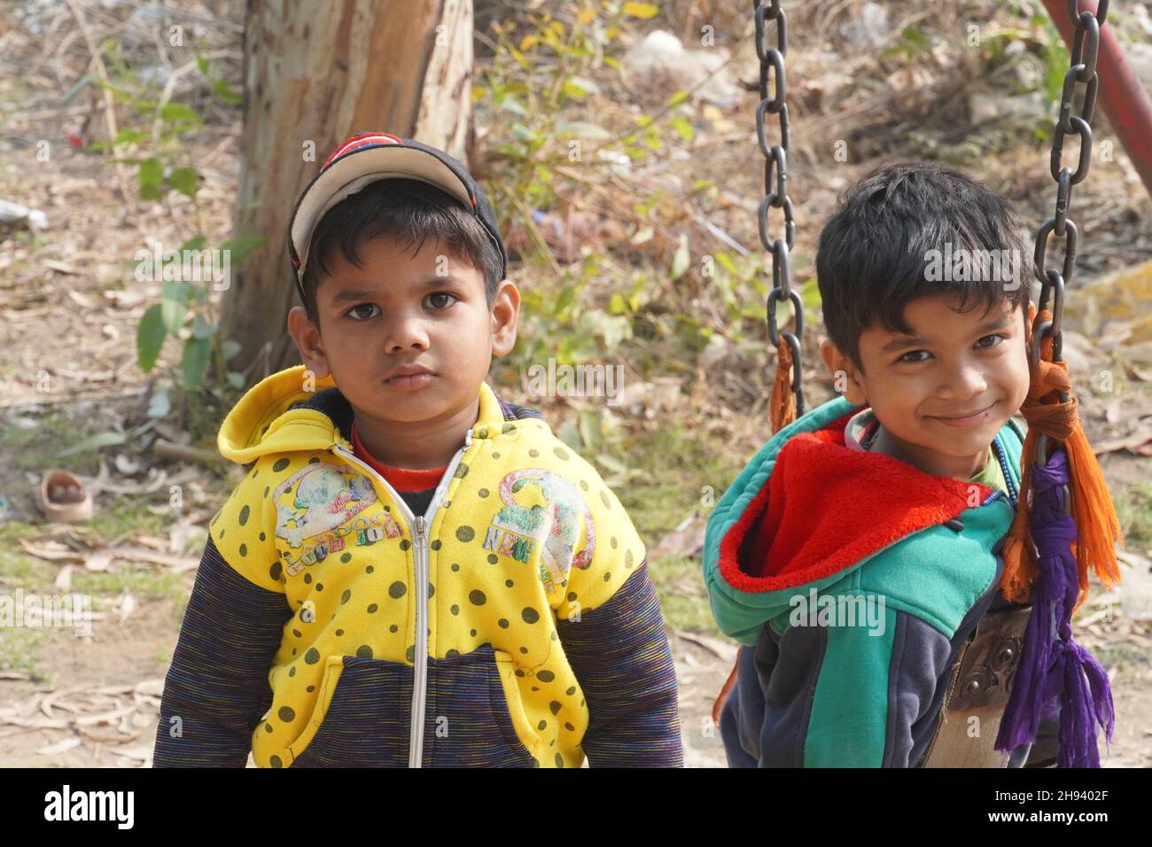 Poor kids smiling hi-res stock photography and images - Alamy
