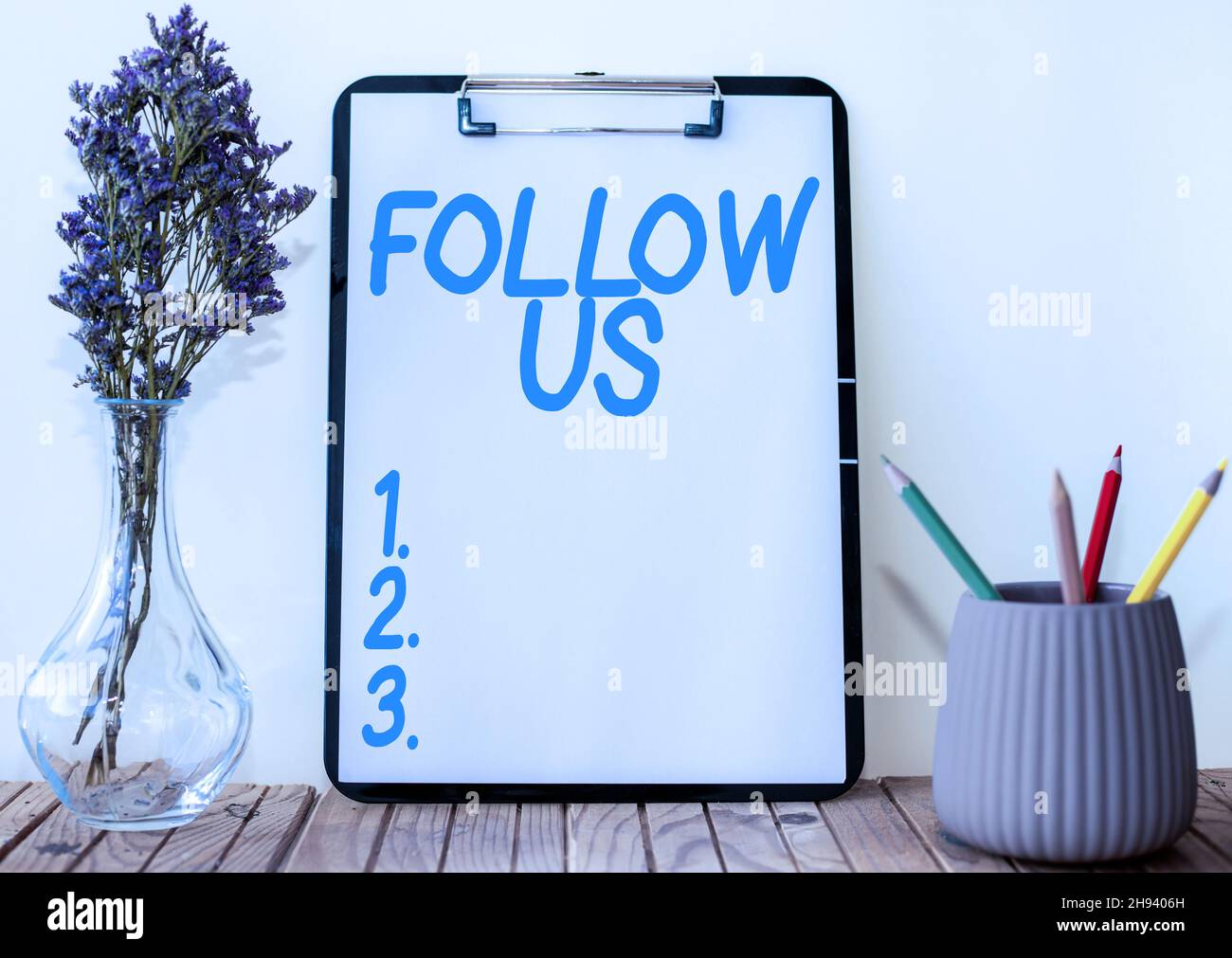 Conceptual caption Follow Us. Business idea To invite a person or group ...