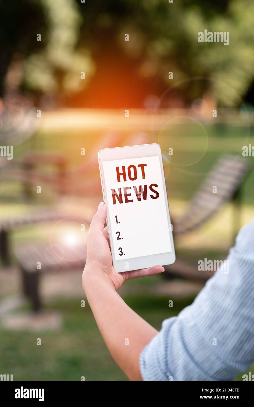 Sign displaying Hot News, Conceptual photo subject that experiences ...
