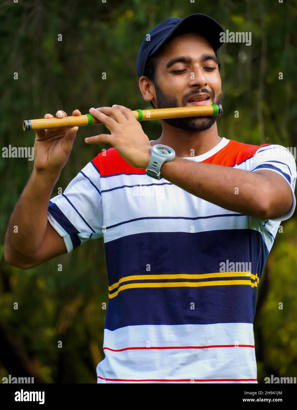 Young woman playing flute hi-res stock photography and images - Alamy