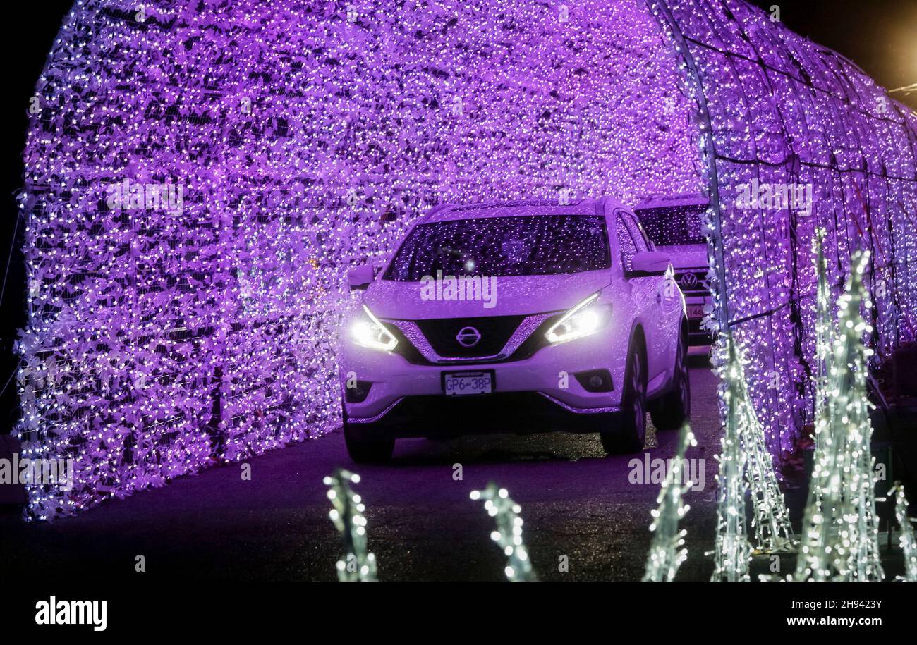 Vancouver, Canada. 3rd Dec, 2021. People watch light shows in their ...