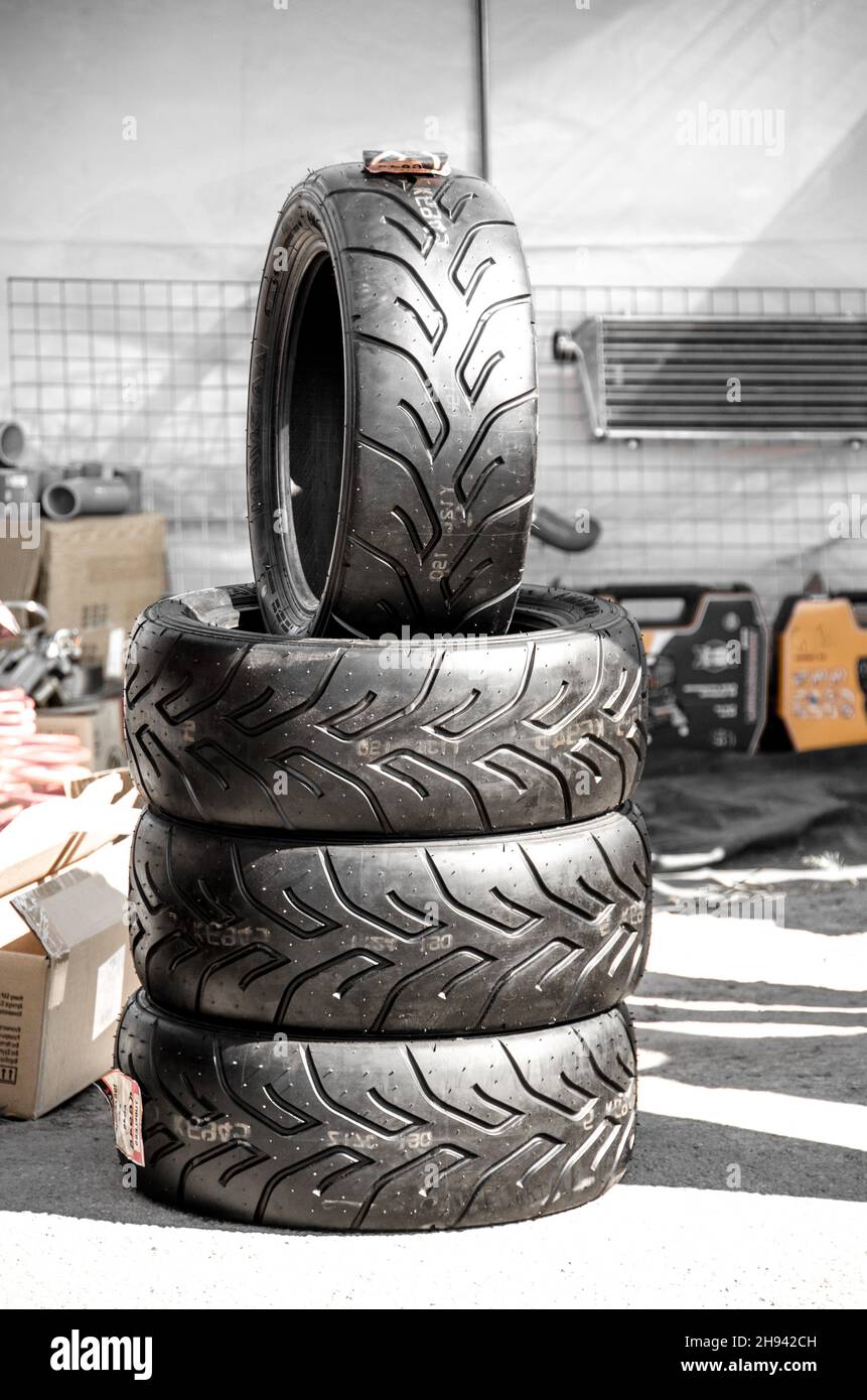 Stack of four wheels Stock Photo - Alamy