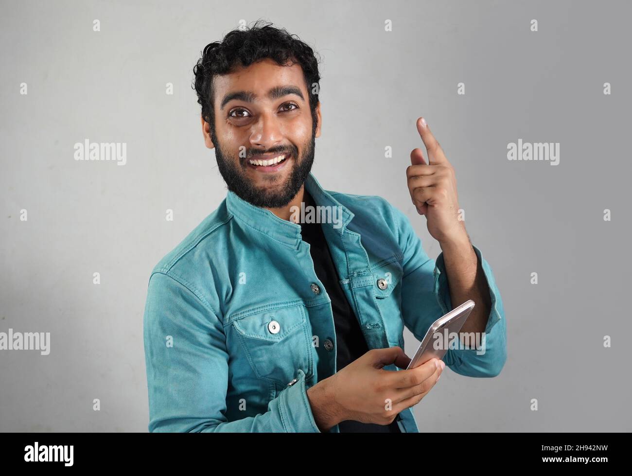a man having mobile white background Stock Photo - Alamy