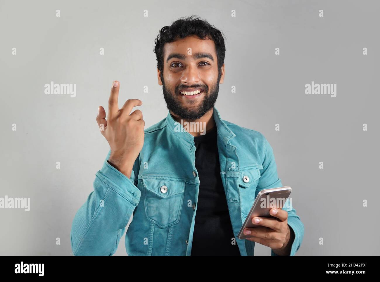 a man having mobile white background Stock Photo - Alamy