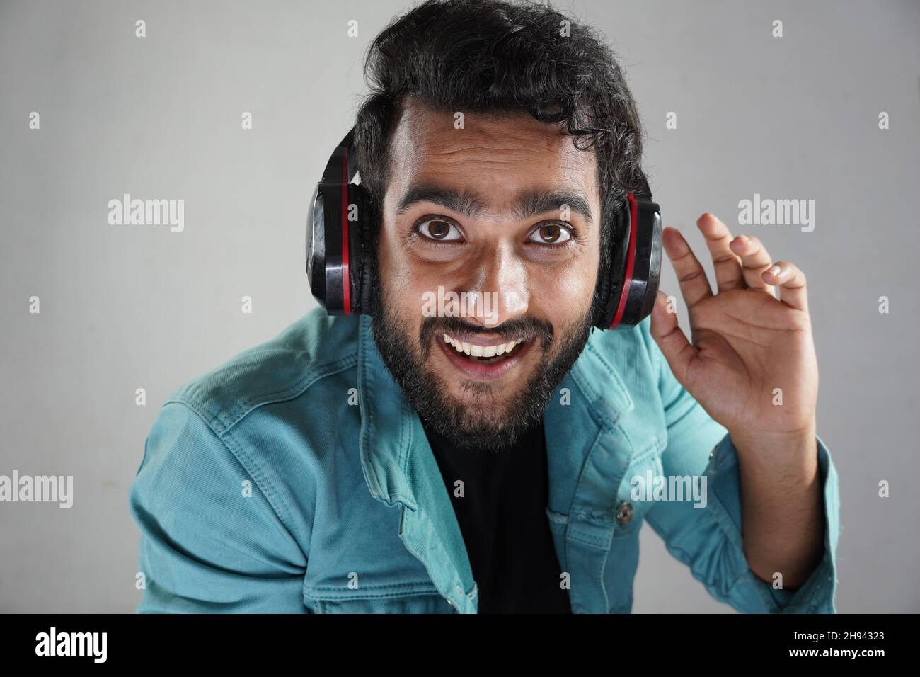 a man in video call wearing headphones Stock Photo - Alamy
