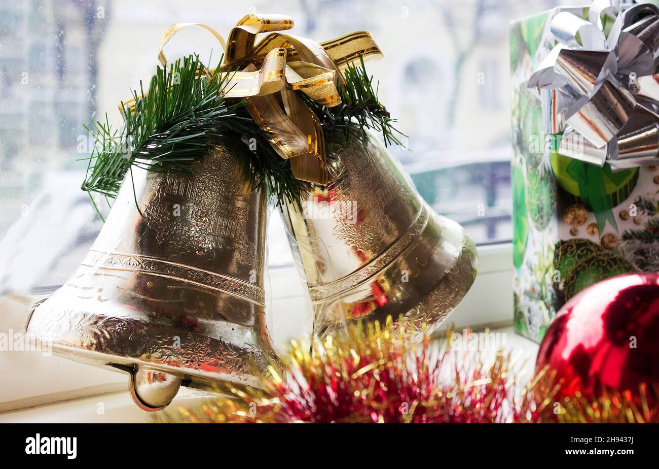 Christmas bells - decorations on the window, close up Stock Photo - Alamy