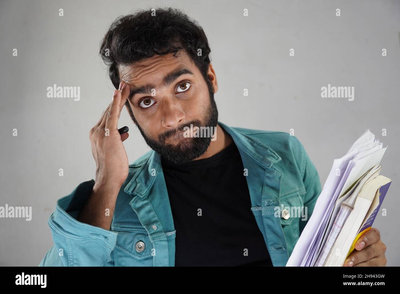 Having paper and books not intrested in stuy with white background ...