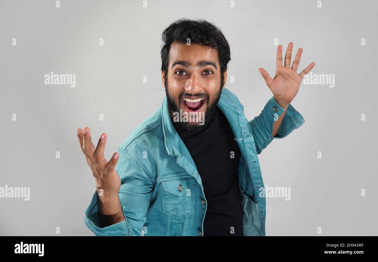 Excited man in white background image Stock Photo - Alamy