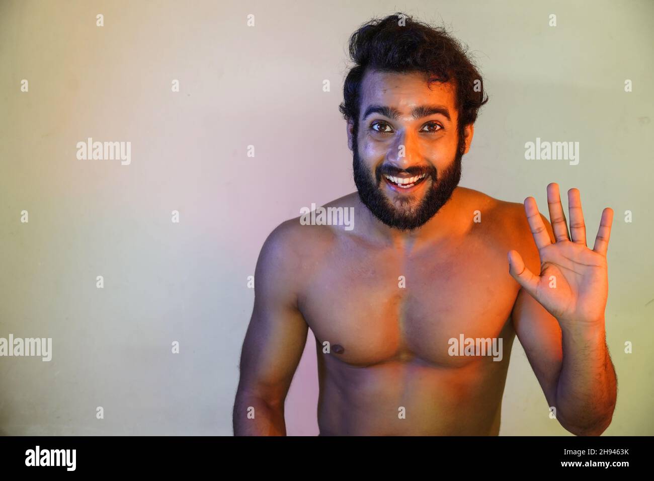 a healthy man saying hi Stock Photo - Alamy