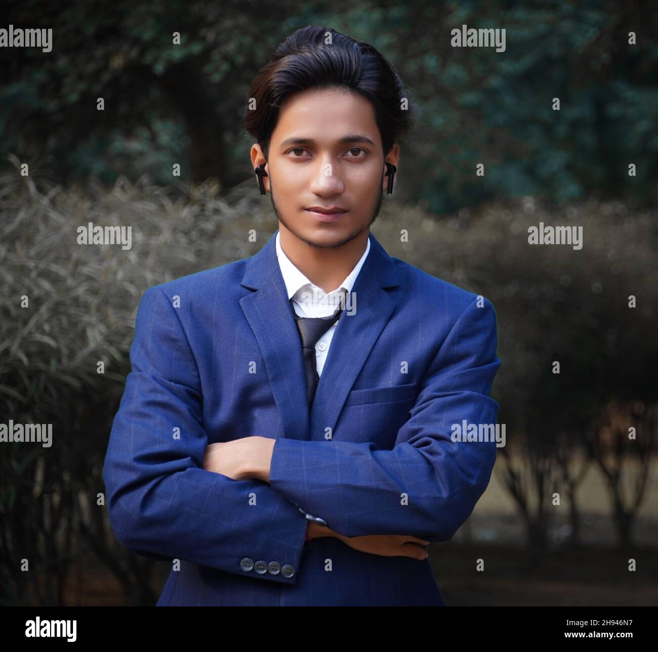 Portrait of a handsome CEO smiling Stock Photo - Alamy