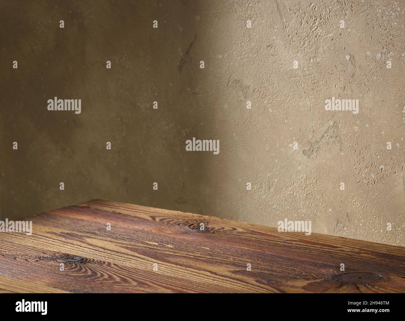 beige color wall and brown wooden table background Stock Photo - Alamy