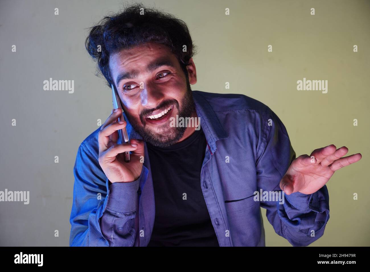 man talking prank call image Stock Photo - Alamy