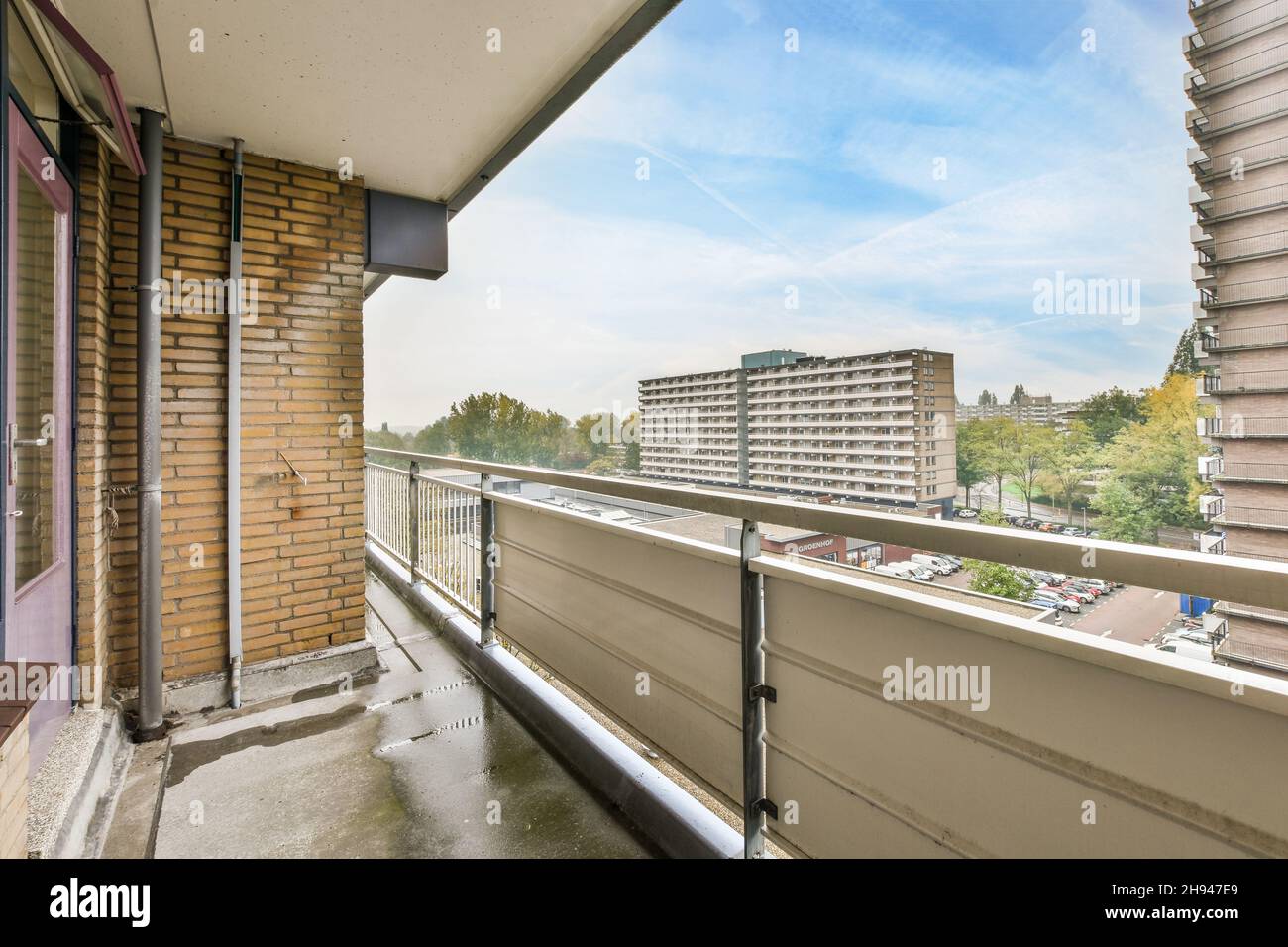Balcony of a beautiful house in the daytime Stock Photo - Alamy