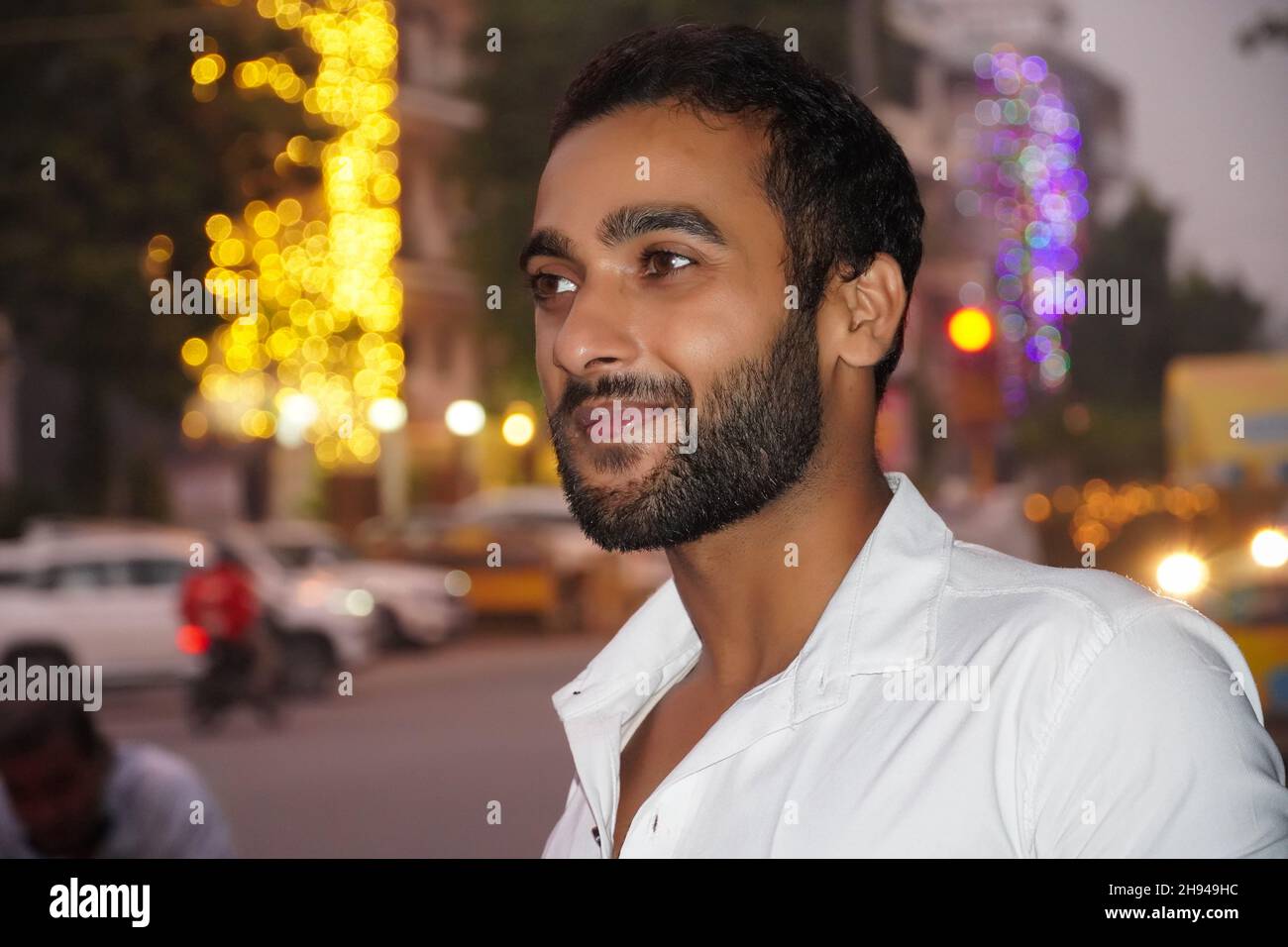 Handsome happy man waiting back hi-res stock photography and images - Alamy