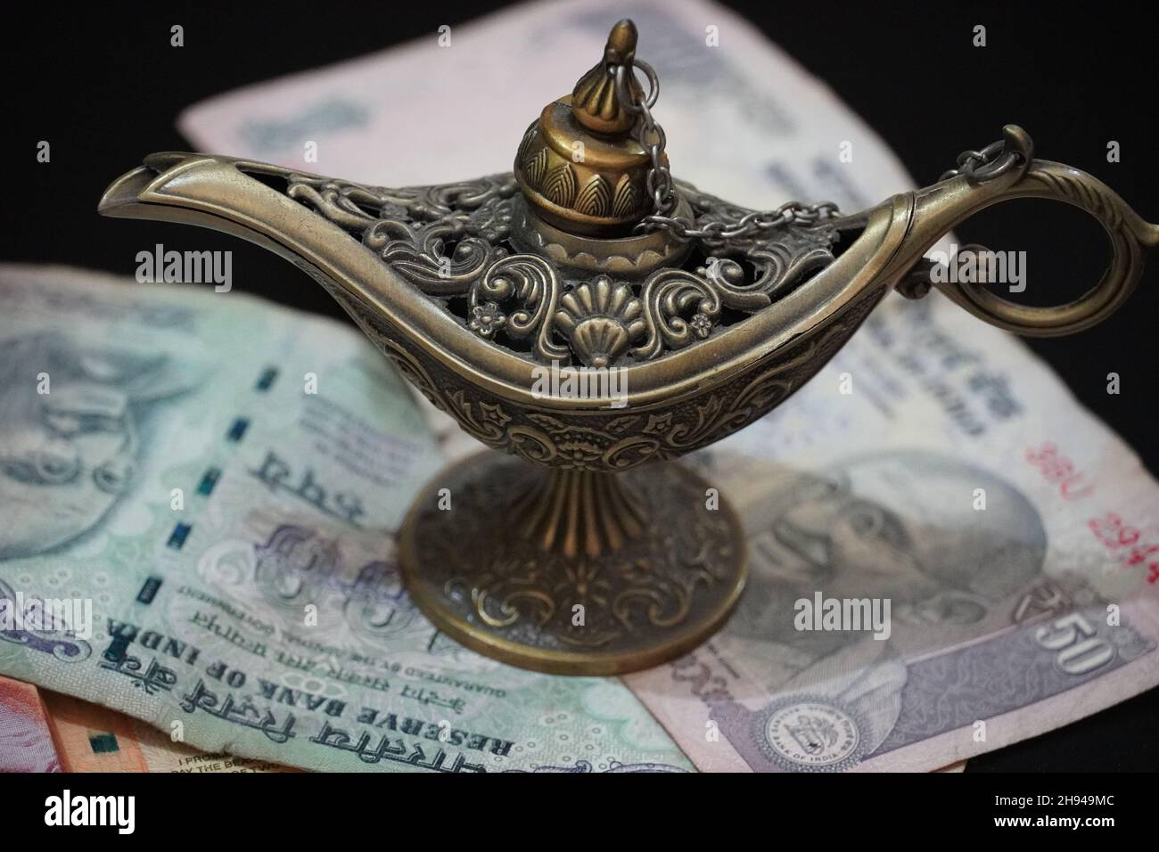 Money magic lamp hi-res stock photography and images - Alamy