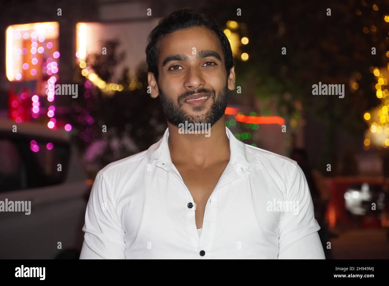 a young man with beautiful lights Stock Photo - Alamy