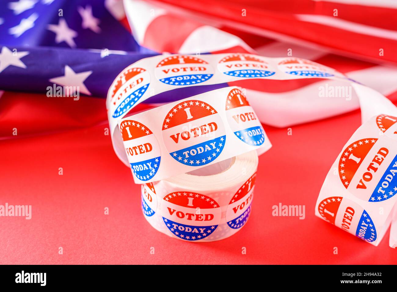I voted today on a sticker label next to a flag of the United States of ...