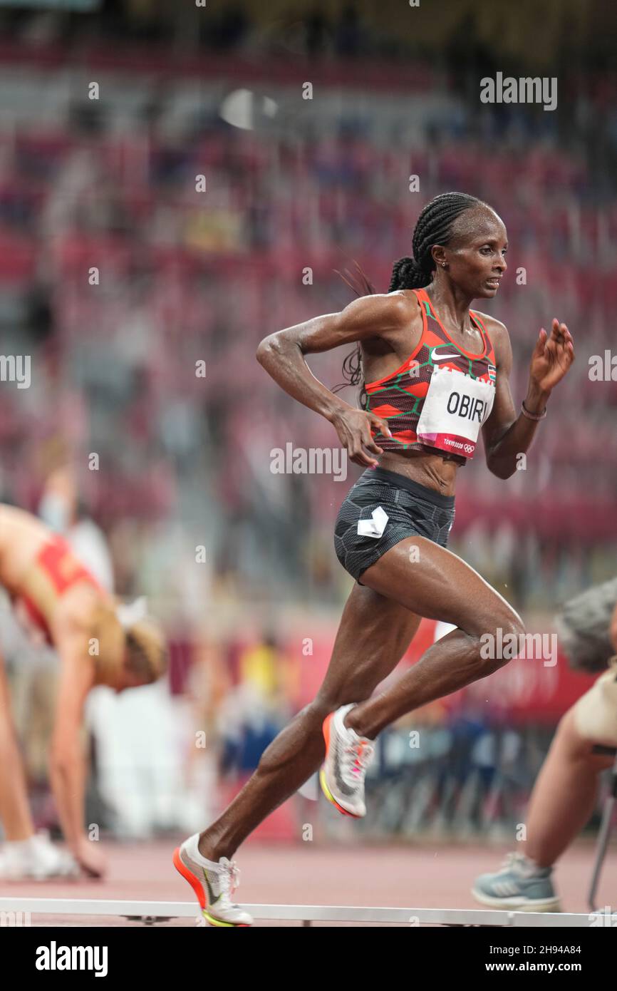 Hellen Obiri competing in the 10,000 meters of the 2020 Tokyo Olympics ...