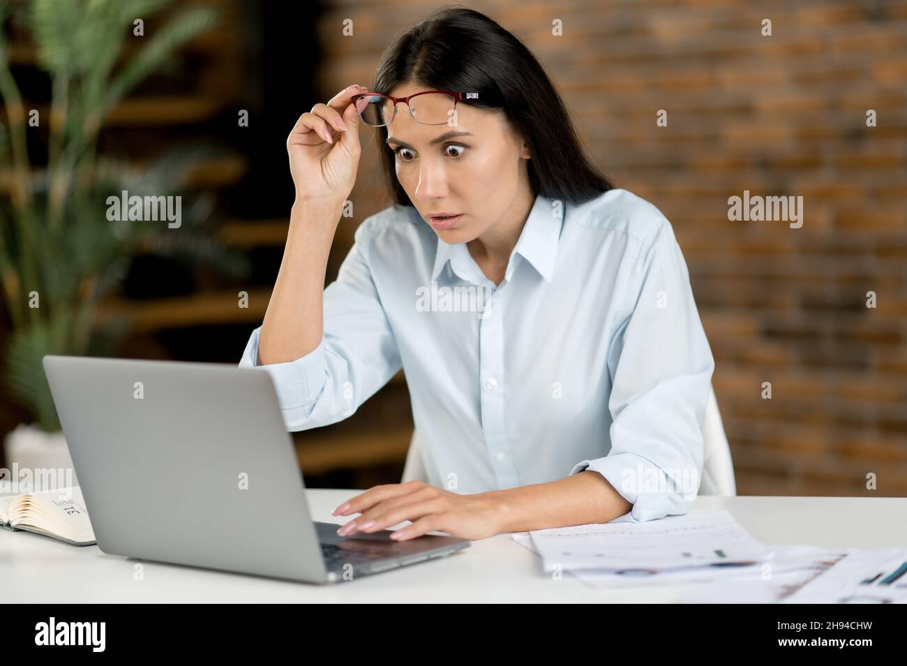 Surprised shocked secretary desk hi-res stock photography and images ...