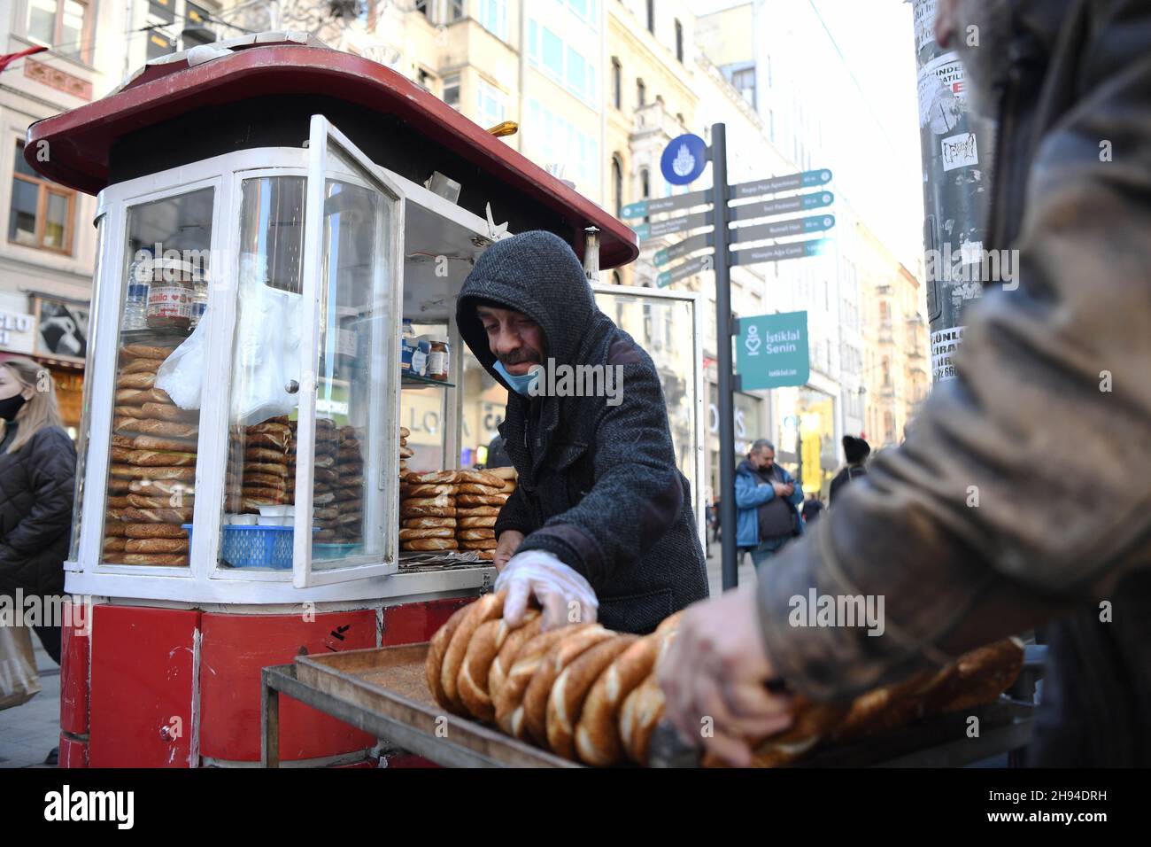 Istanbul, Turkey. 2nd Dec, 2021. Emin Korkmaz sells simit at the Taksim ...