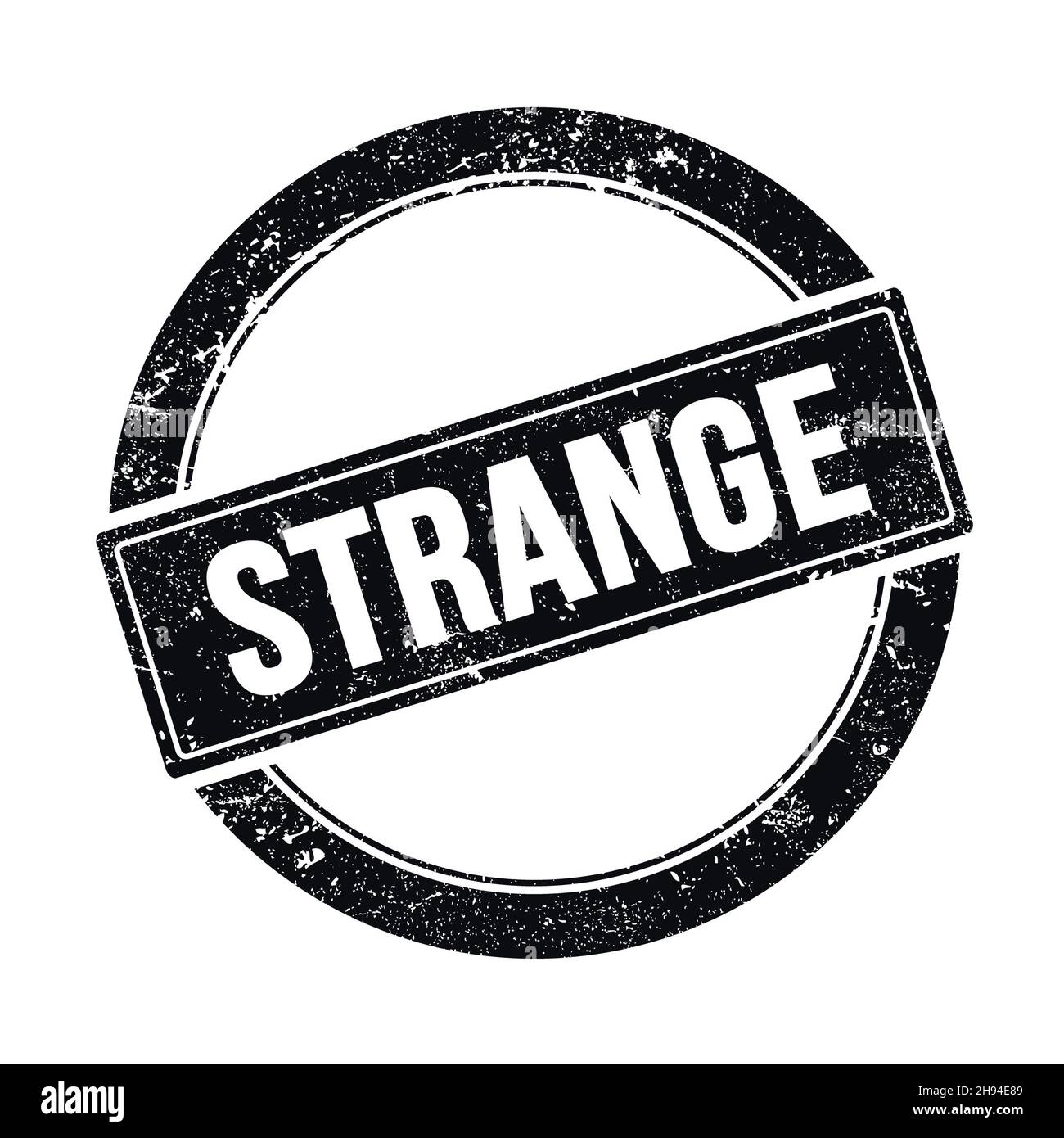STRANGE text on black grungy round vintage stamp Stock Photo - Alamy