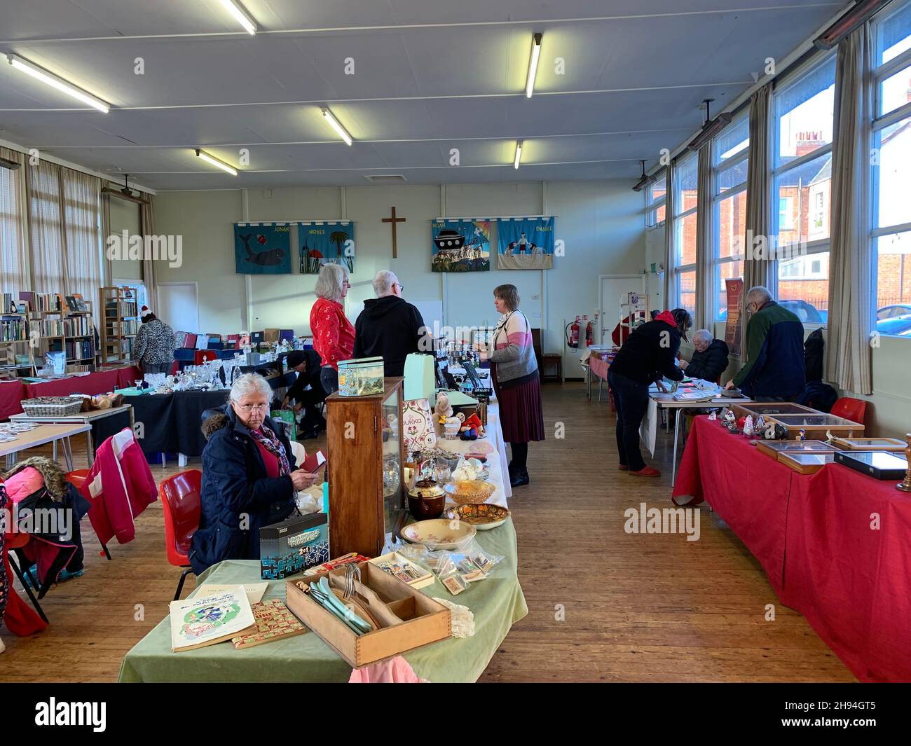 antique market Northampton UK stallholder stallholders sit sitting ...