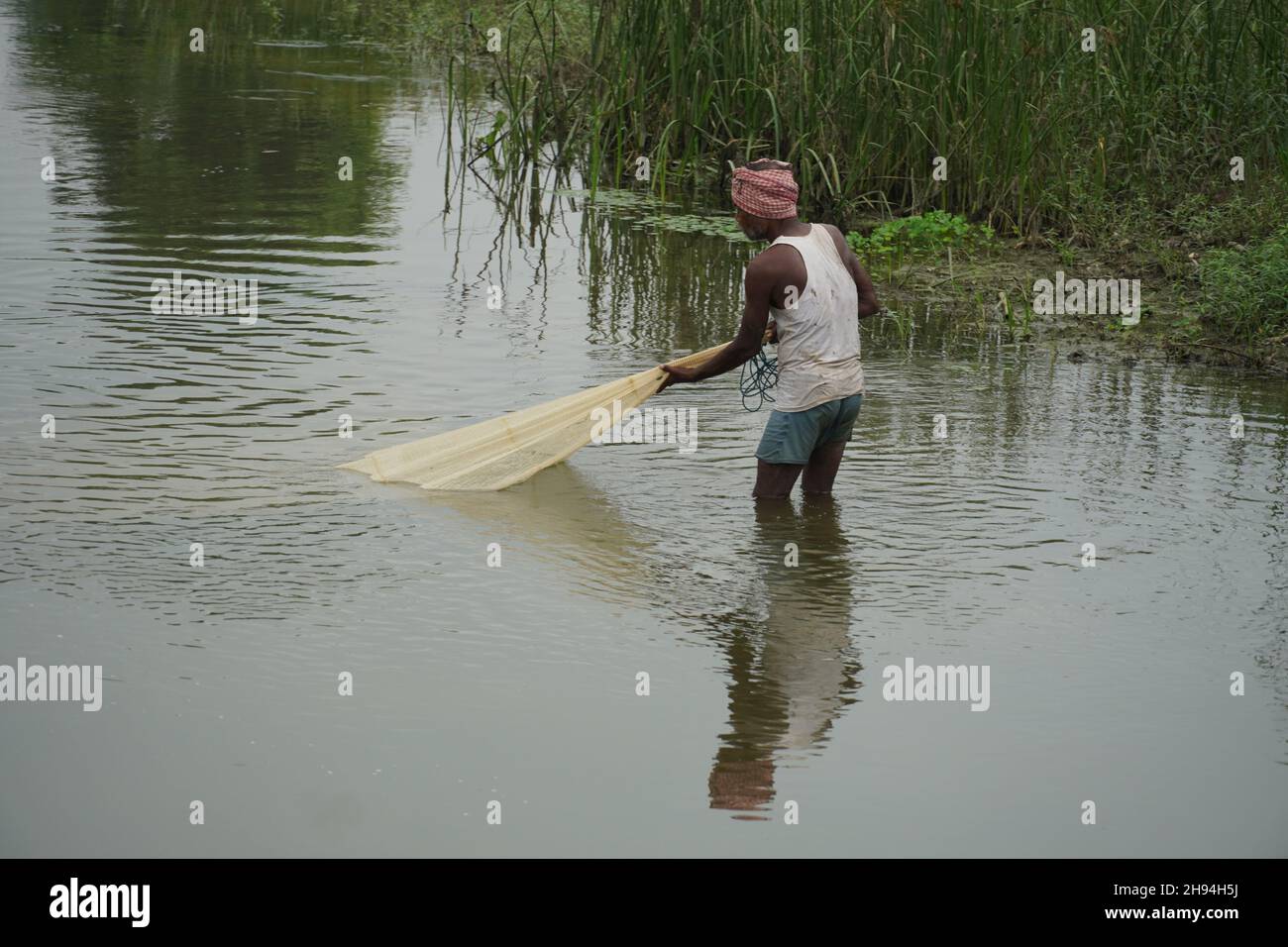 Boy catching fish boat hi-res stock photography and images - Alamy