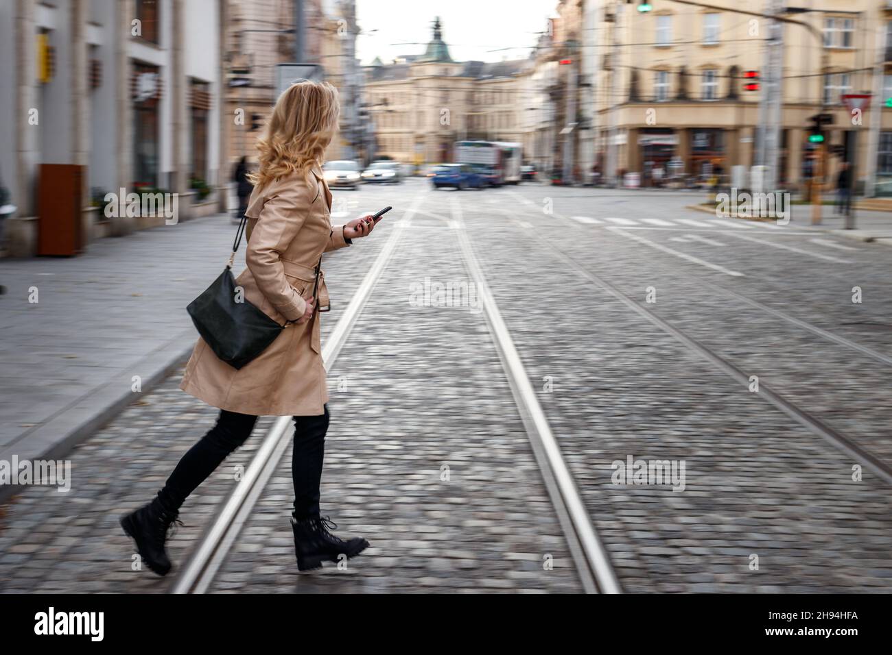 Woman rushing to work hi-res stock photography and images - Alamy