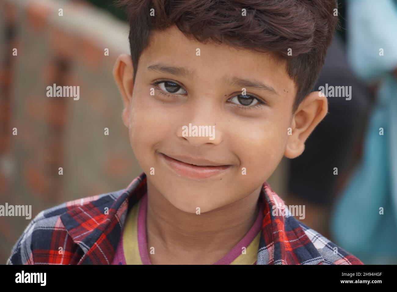 A cute boy with smiley face Stock Photo - Alamy