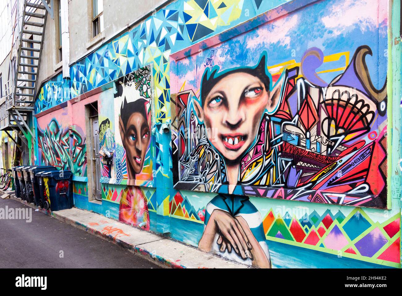 Urban art or graffiti paintings in the walls of the bohemian district ...