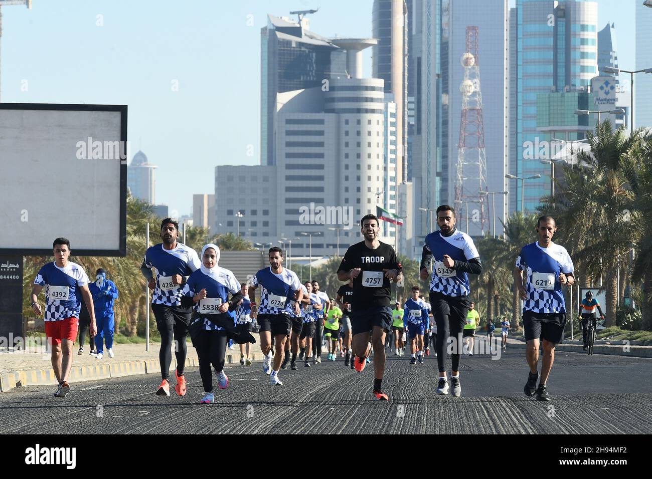 Kuwait. 4th Dec, 2021. People participate in a marathon in Kuwait City ...