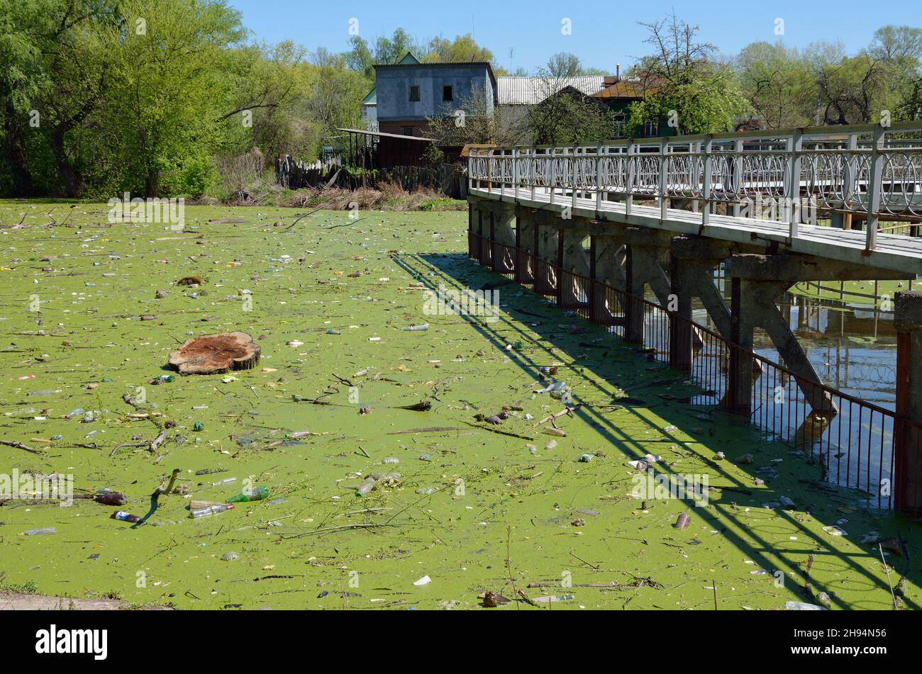 Garbage in the river Stock Photo - Alamy
