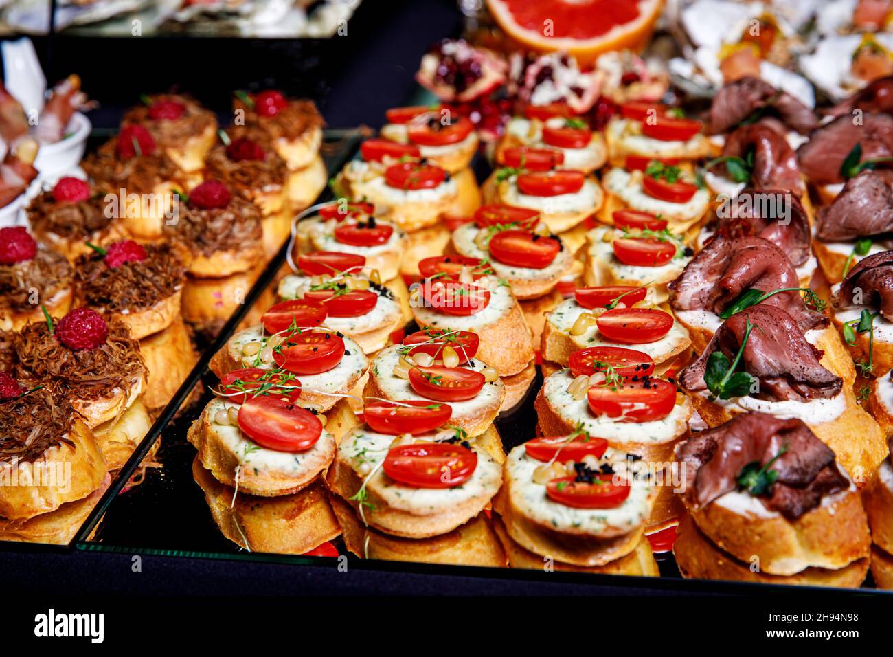 Catering services with snacks on guests table in the restaurant at the ...