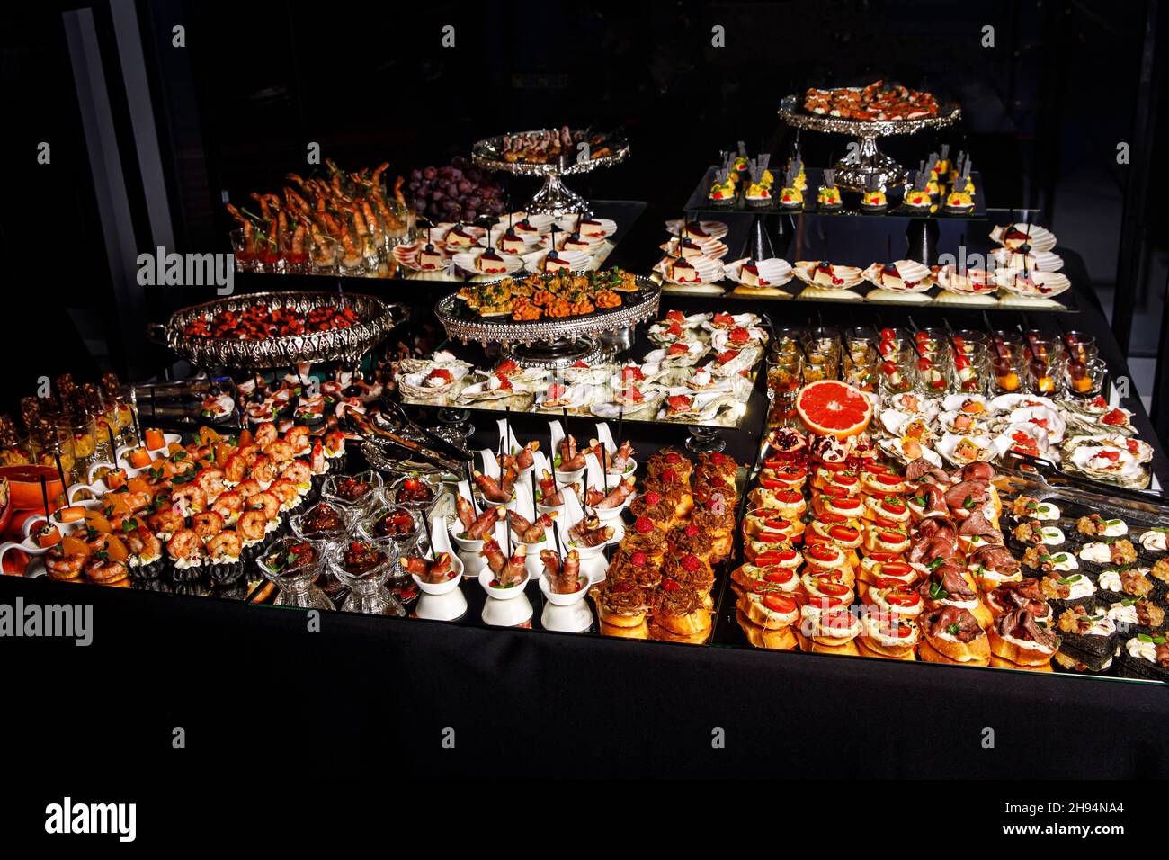 Catering services with snacks on guests table in the restaurant at the ...