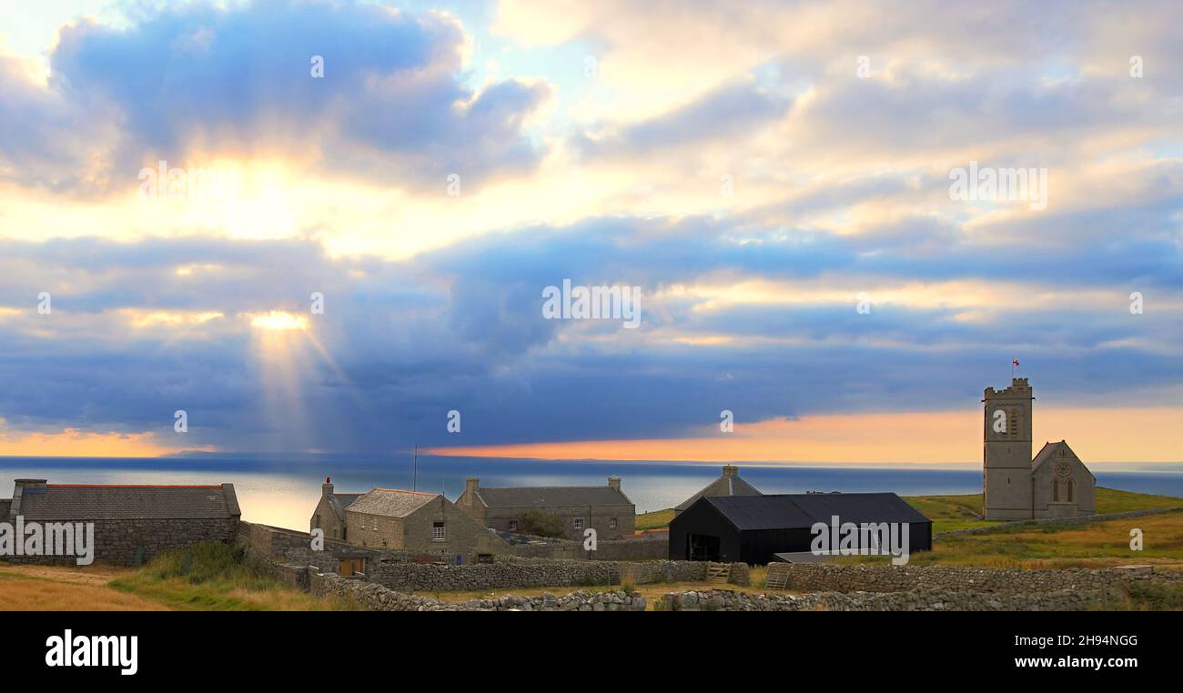 Dramatic sunrise over Lundy Village & St Helen's Church on Lundy Island ...
