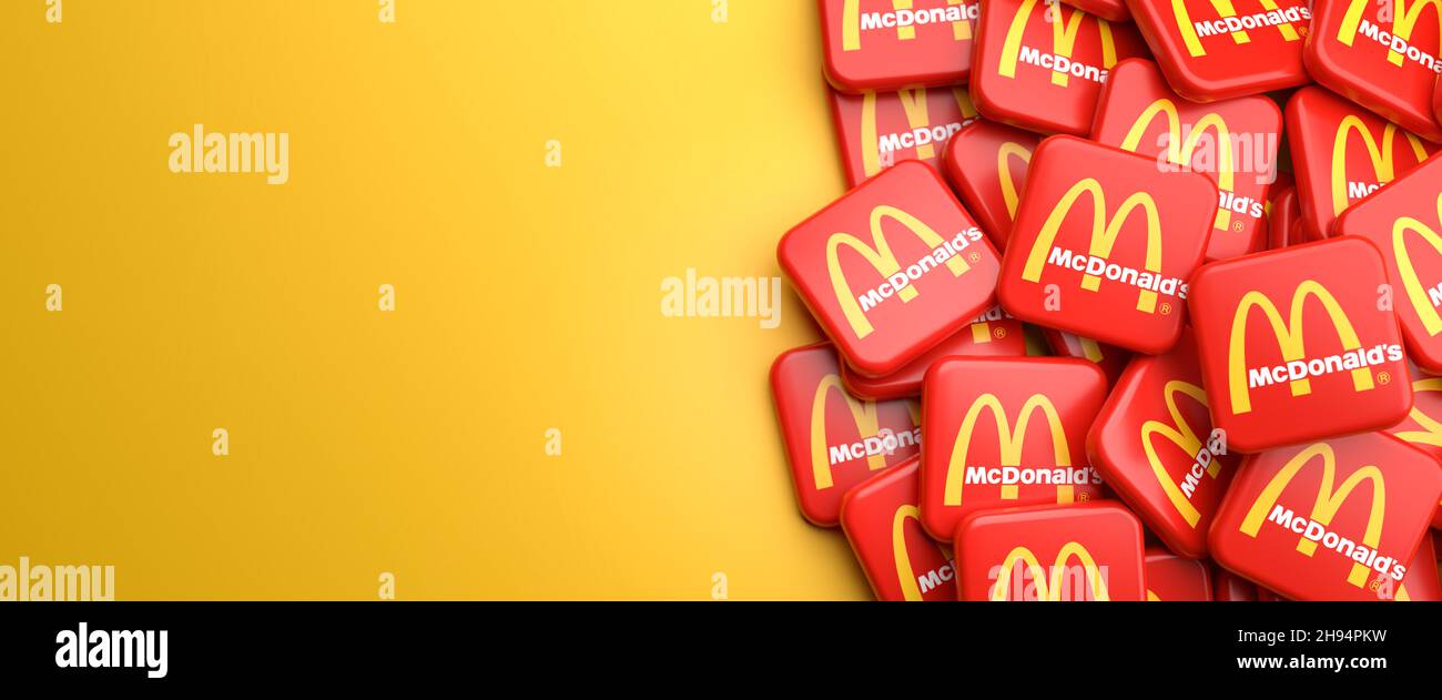 Logos of the American fast-food restaurant chain McDonald's on a heap ...