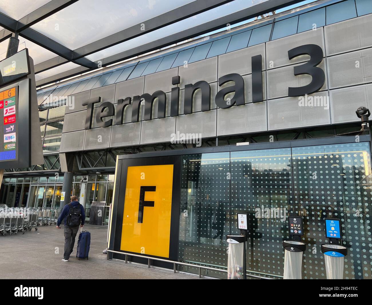 Passengers enter Terminal 3 at London's Heathrow Airport on Dec. 4 ...