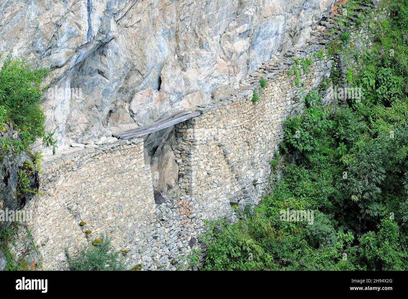 Inca bridge in Machu Picchu in Peru Stock Photo - Alamy