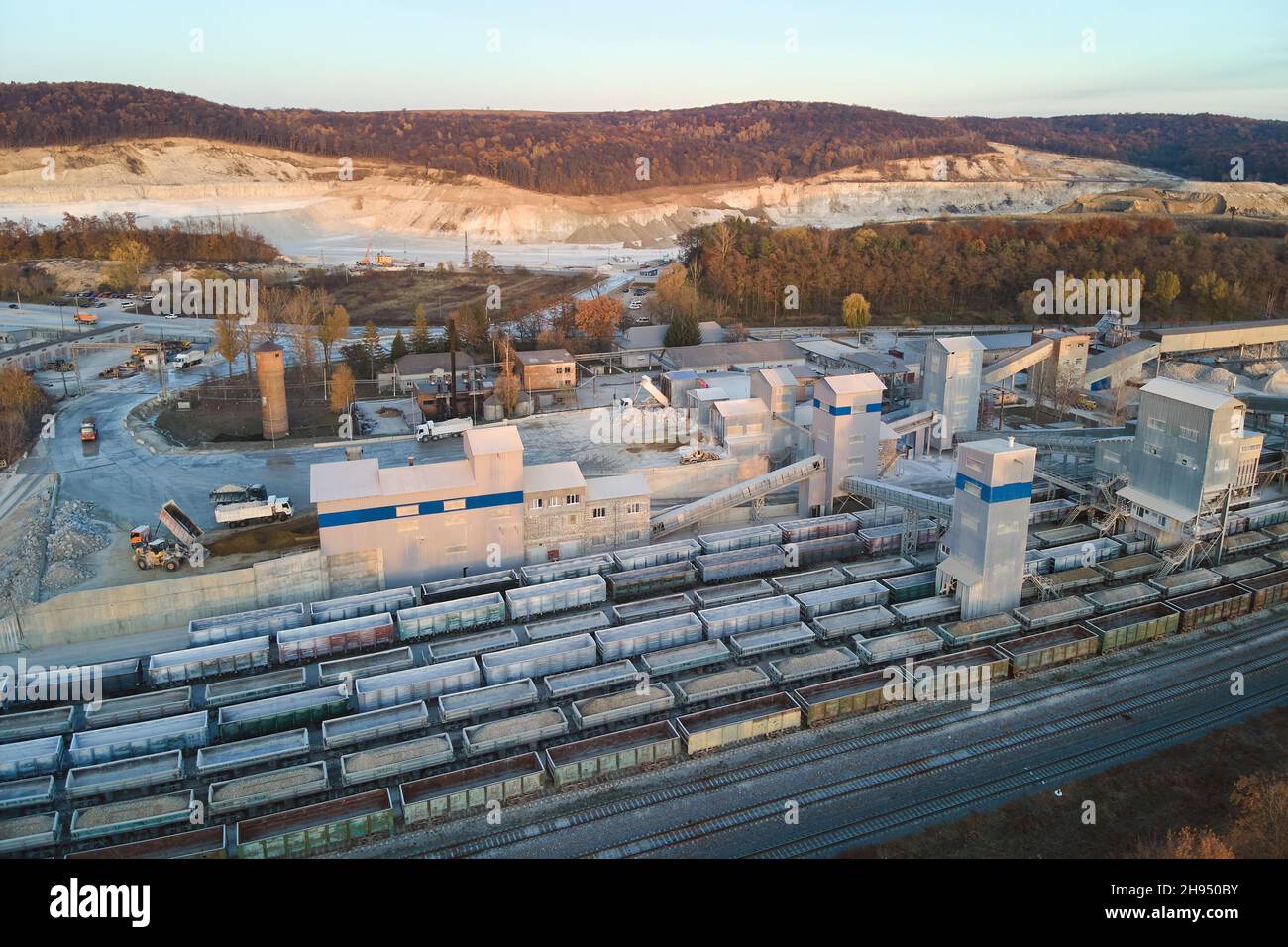 Aerial view of cargo train loaded with crushed stone materials at ...
