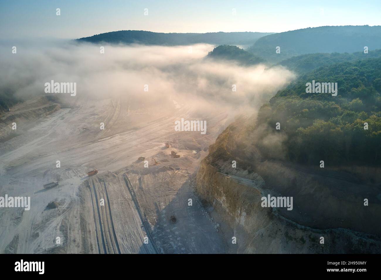 Aerial view of open pit mining of limestone materials for construction ...