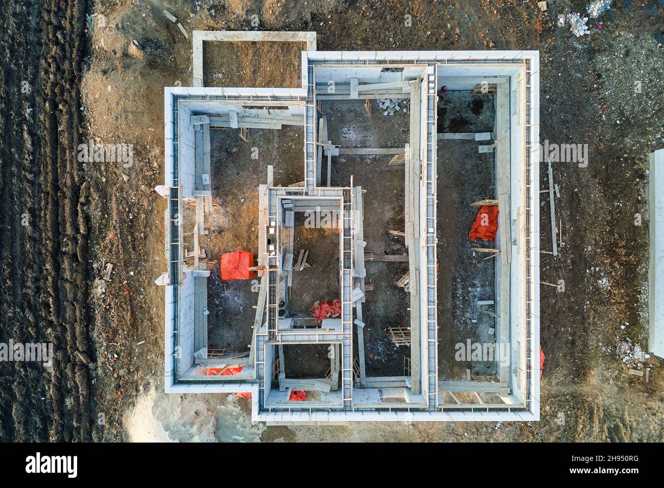 Aerial view of unfinished frame of private house foundation under ...