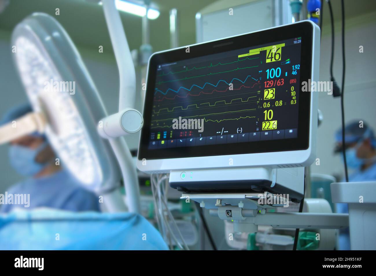Heart rate and patient control monitor in hospital theater room during ...