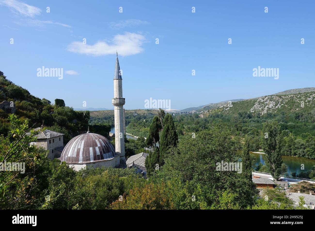 View of mosque in historic Muslim village of Pocitelj near Mostar with ...