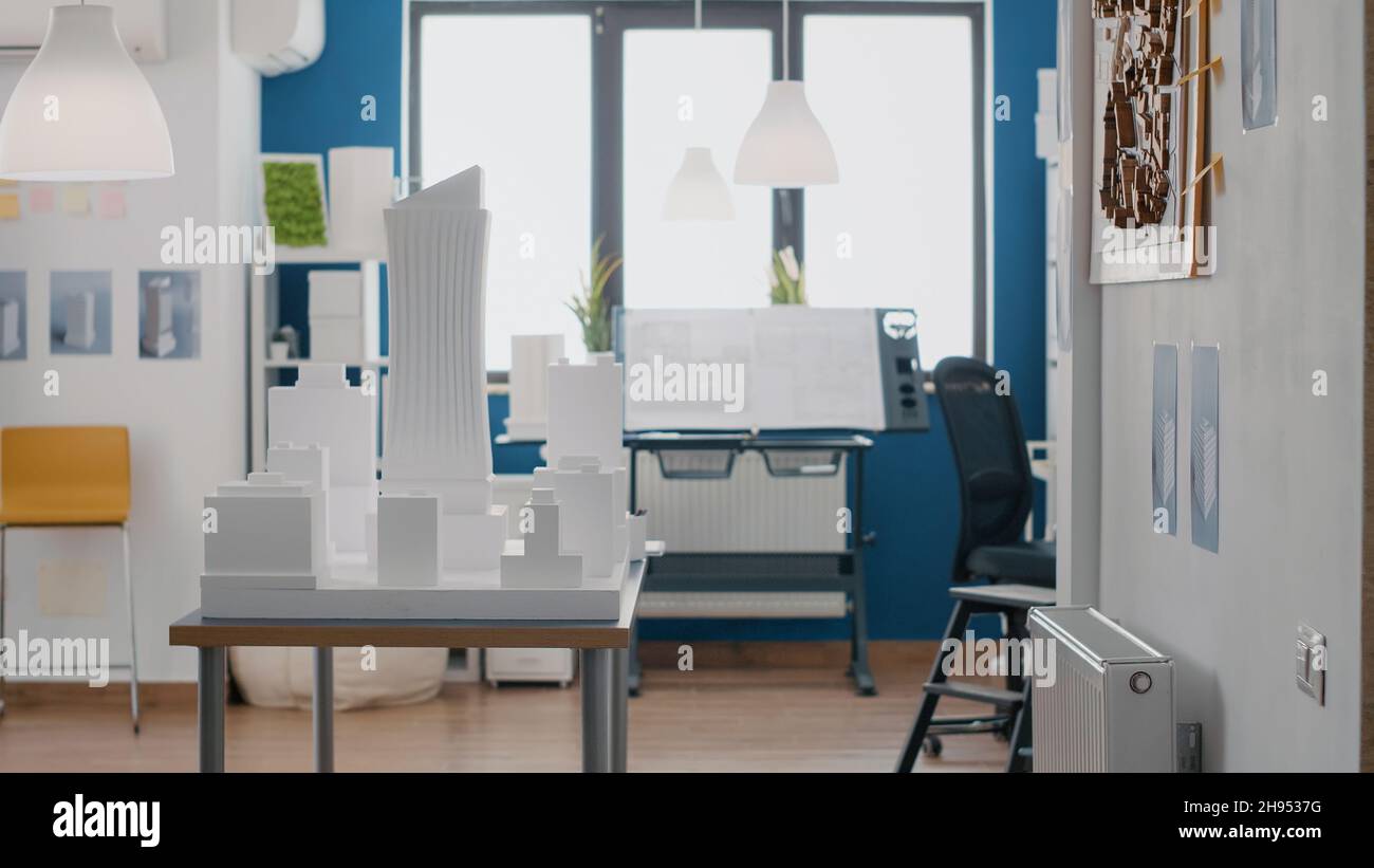 Empty space with maquette on table to design urban property plan and ...