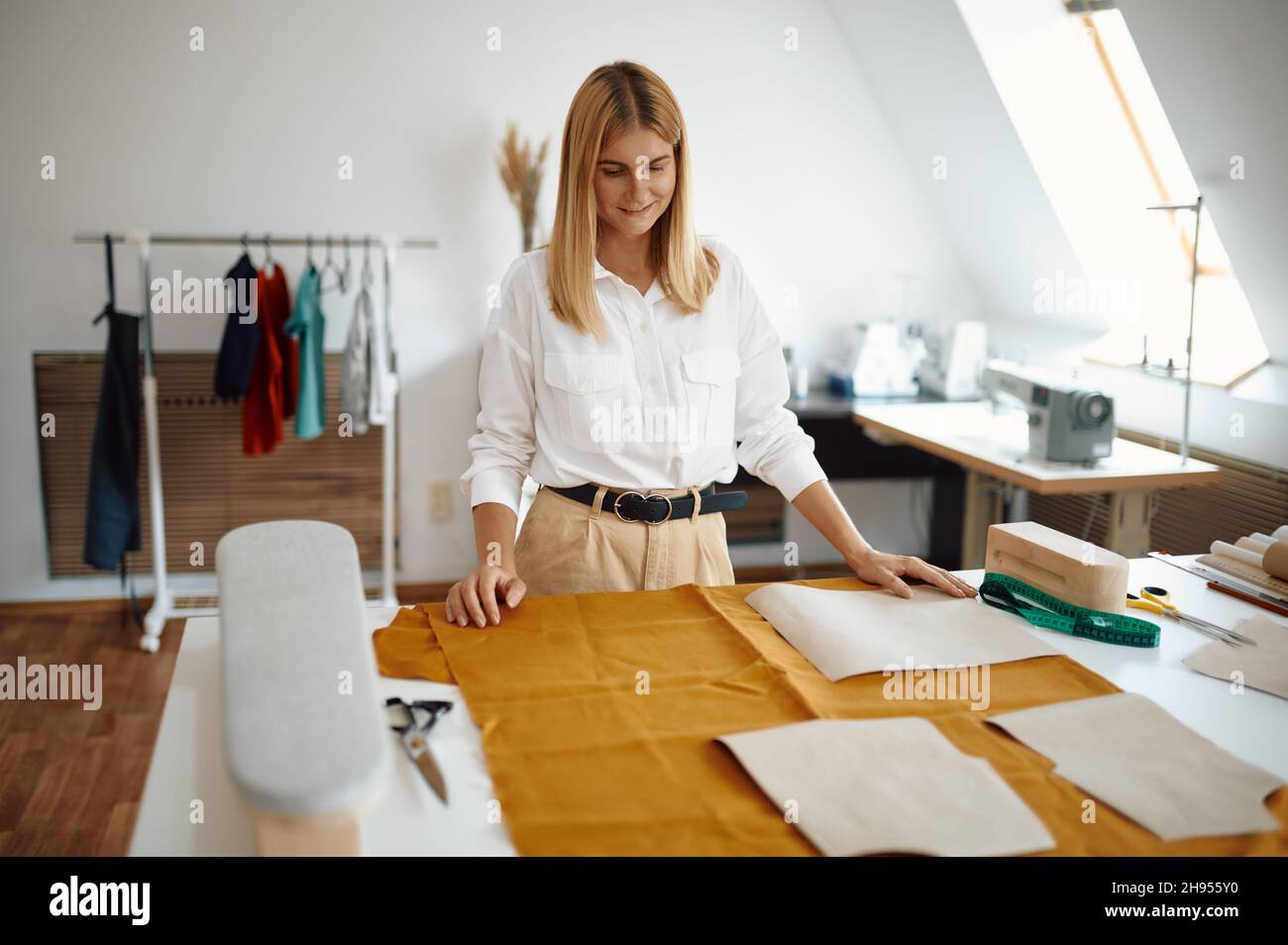 Seamstress works fabric textile hi-res stock photography and images - Alamy